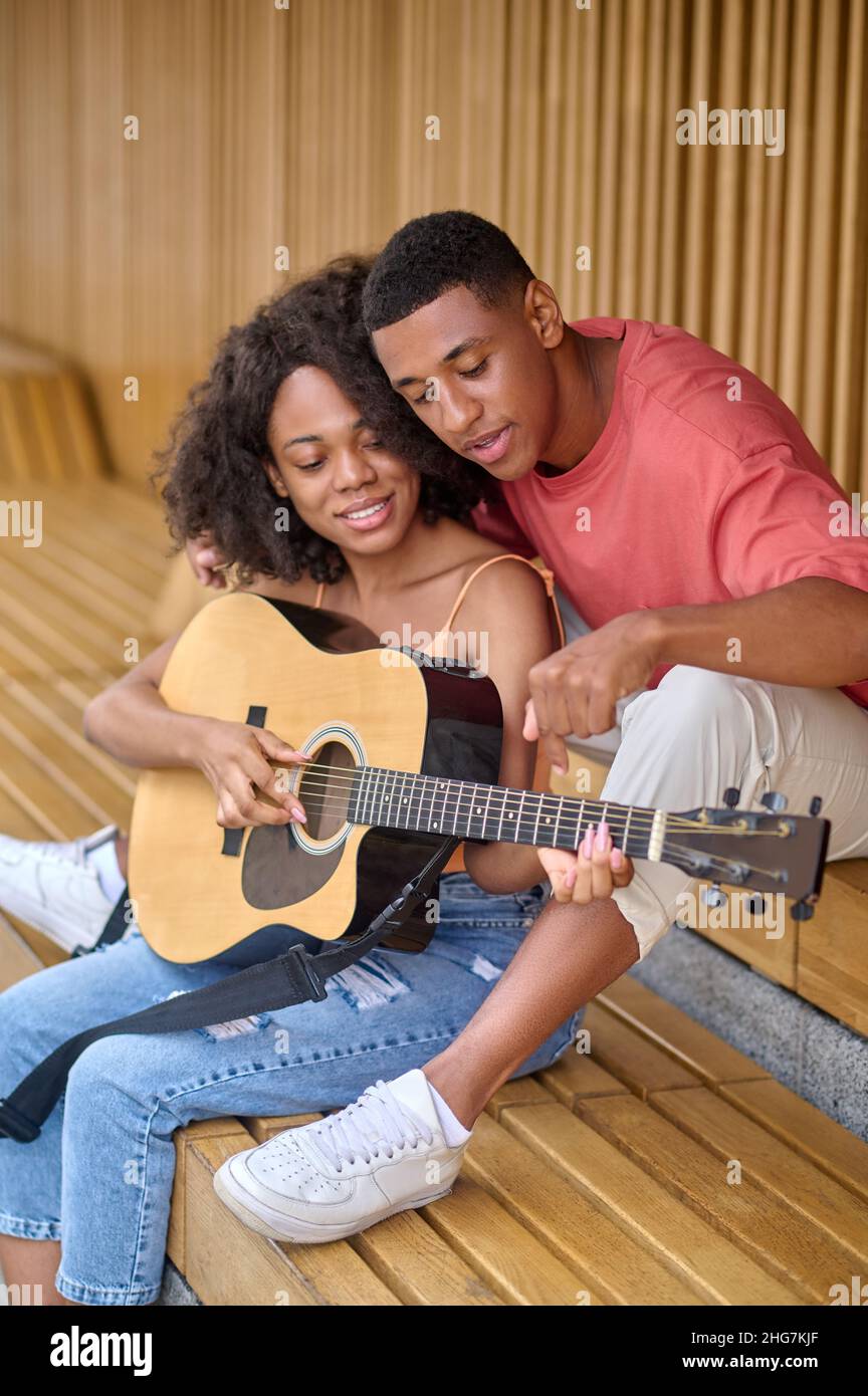 Confident african american woman pointing hi-res stock photography and ...