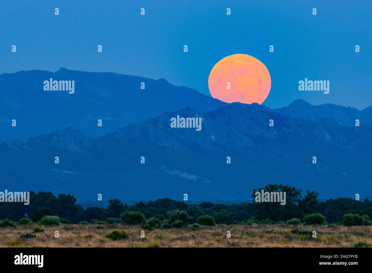 Moonrise over hill hi-res stock photography and images - Alamy