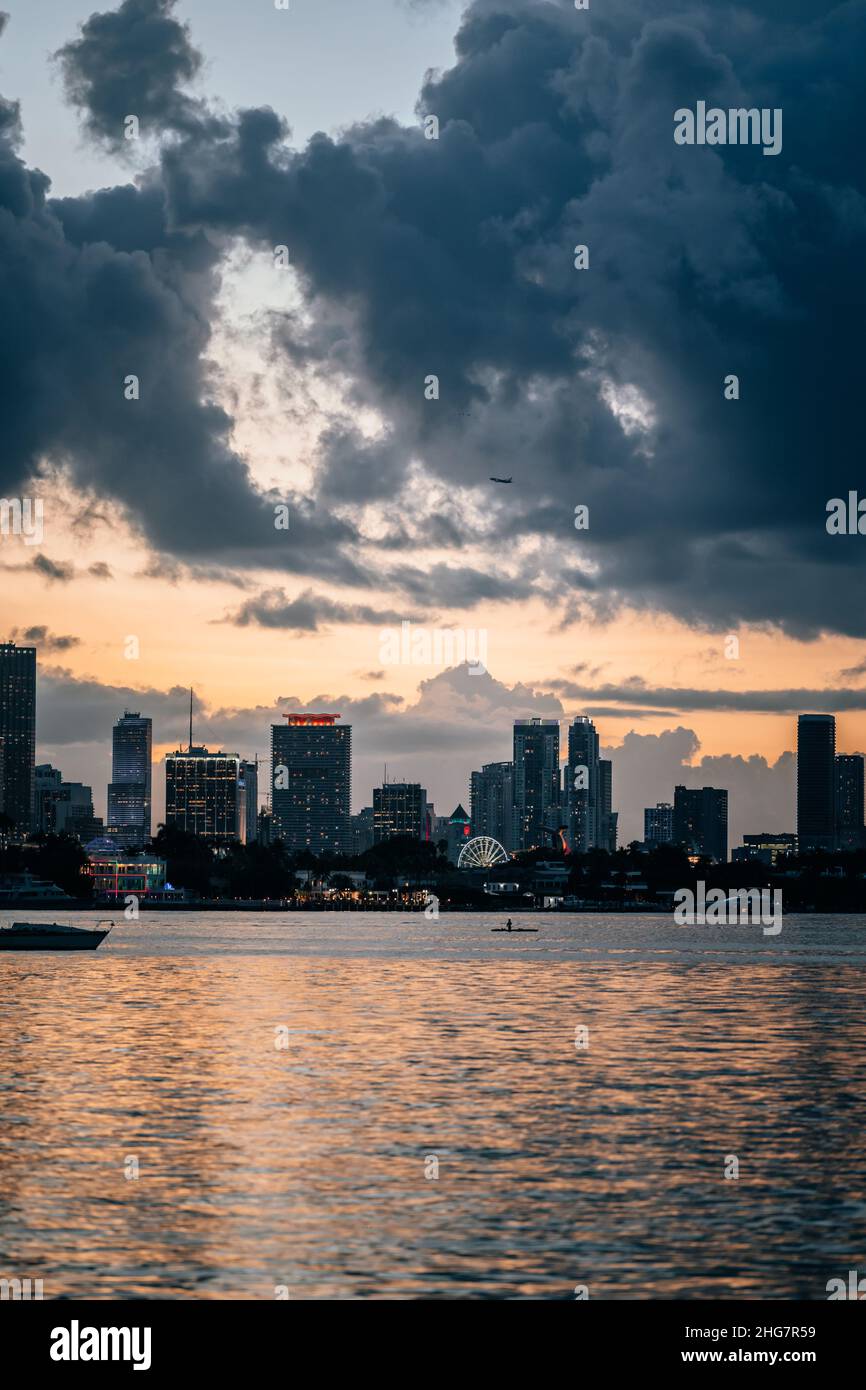 Downtown Miami Florida sunset sea sky clouds Stock Photo - Alamy