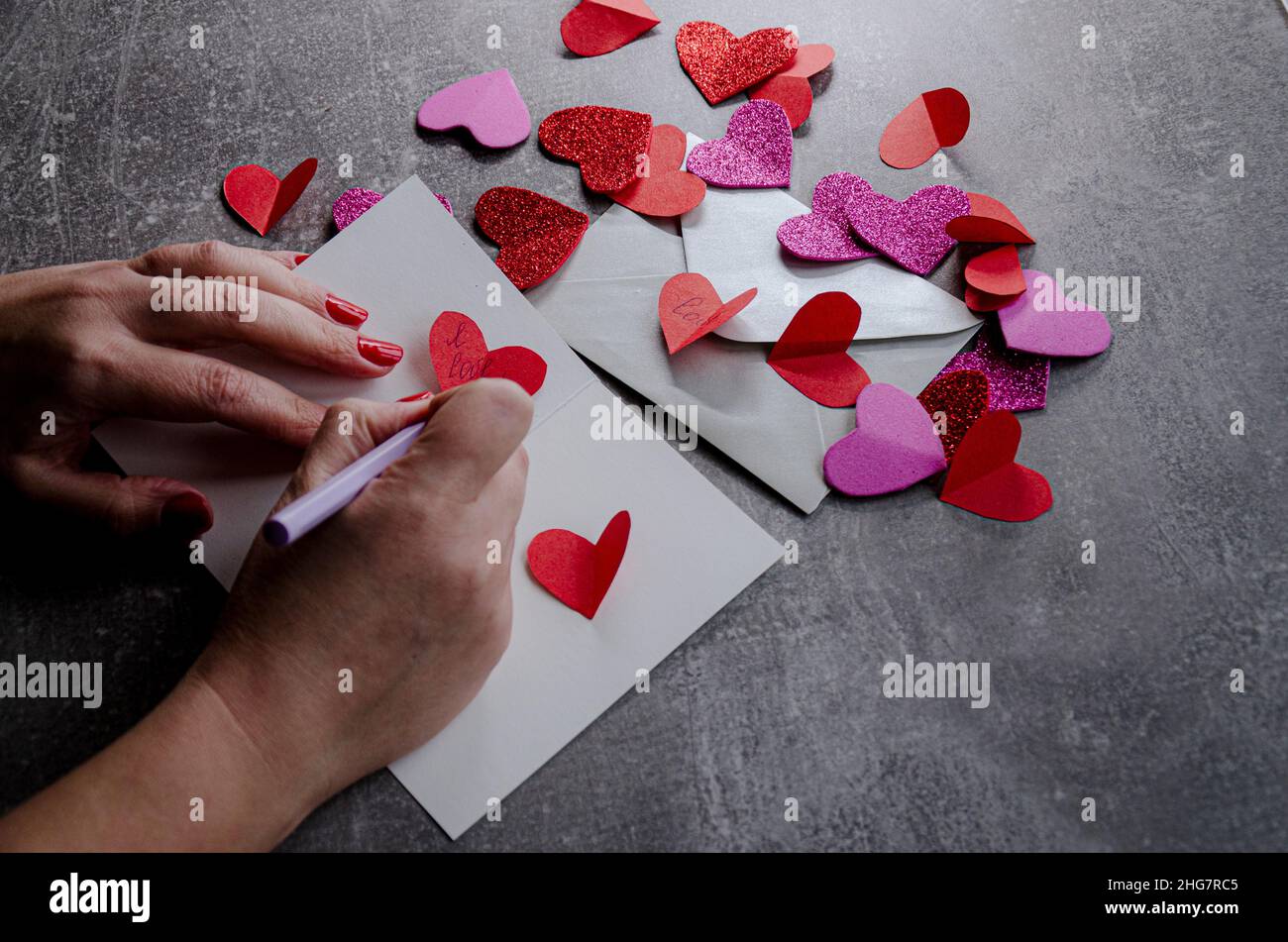 hands sign a love letter Stock Photo - Alamy
