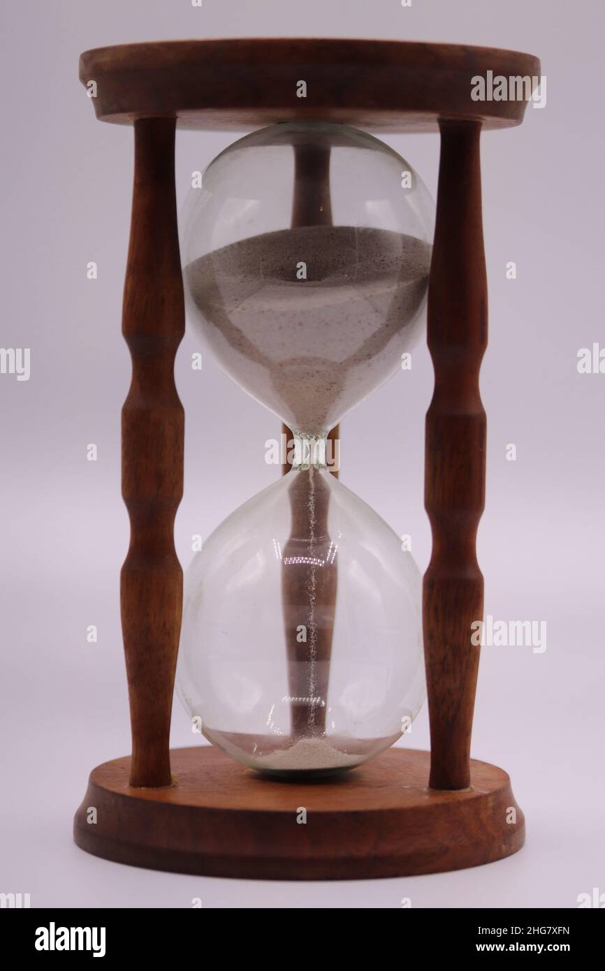 Hourglass still sand counting time Stock Photo - Alamy