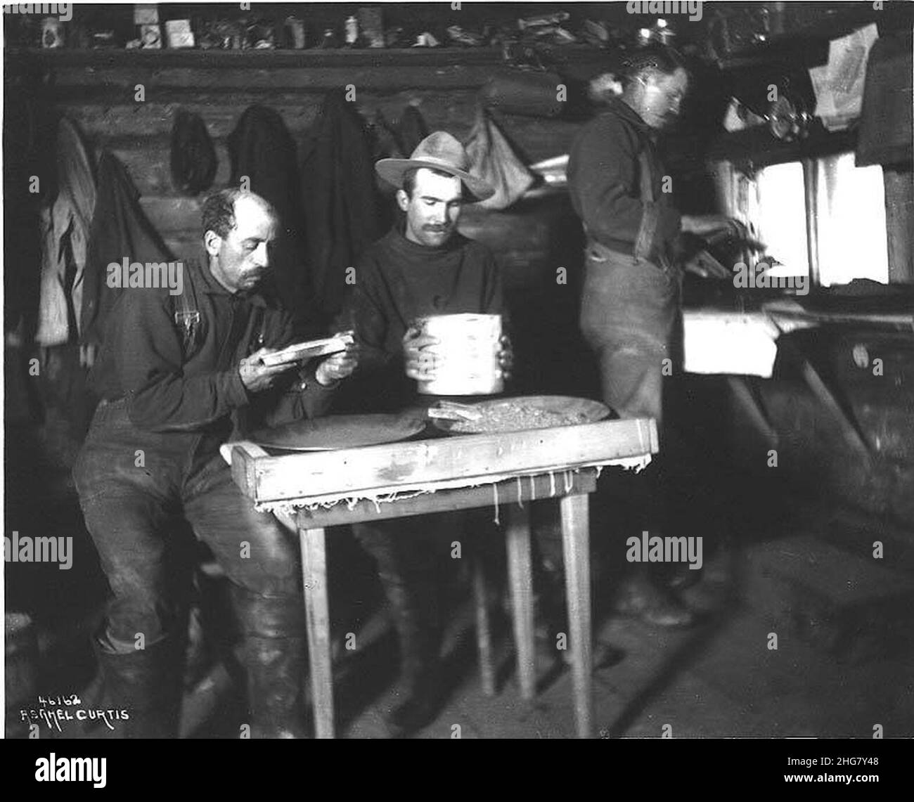 Sifting gold in a cabin, 13 Eldorado, Yukon Territory, 1898 Stock Photo ...