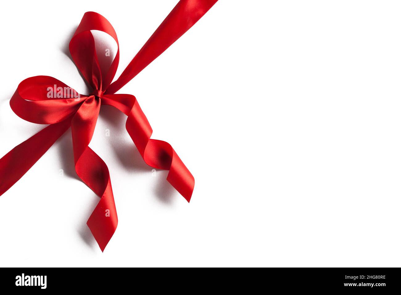 Elegant satin red ribbon bow isolated on white background Stock Photo ...