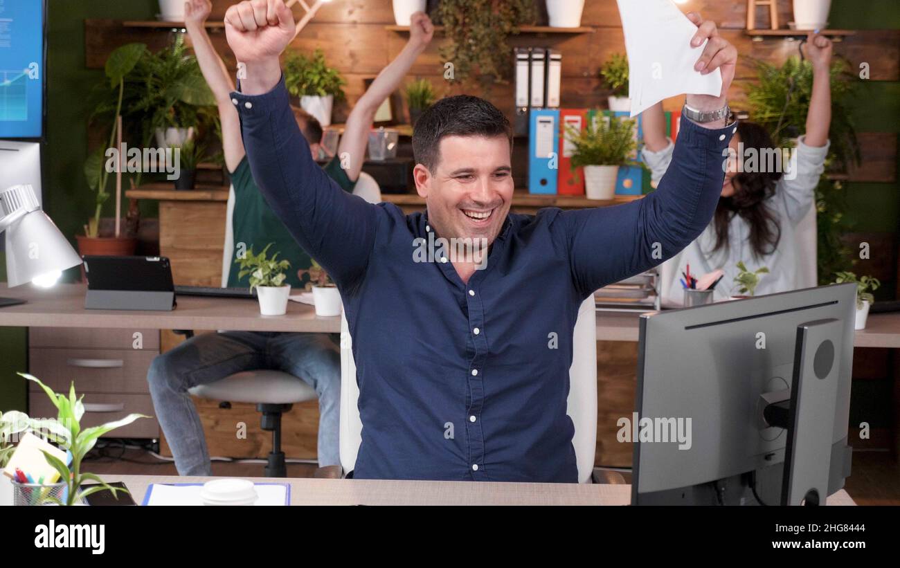 Happy manager throwing papers finishing hi-res stock photography and ...