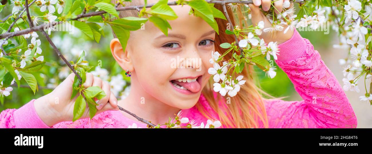 Banner with spring kids portrait. Funny smiling teenager girl with ...
