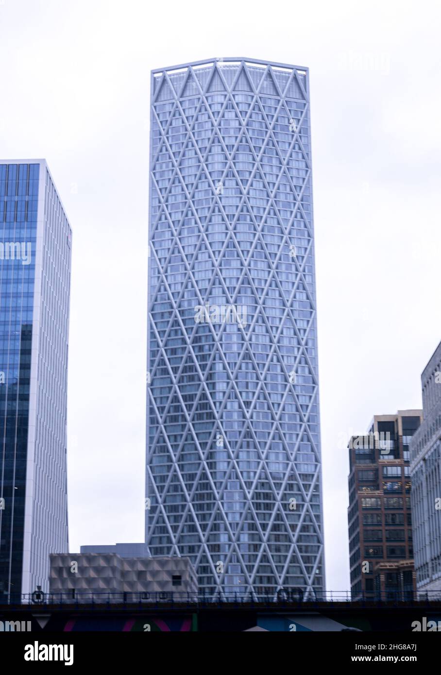 A ground perspective of some high rise buildings in the middle of a ...