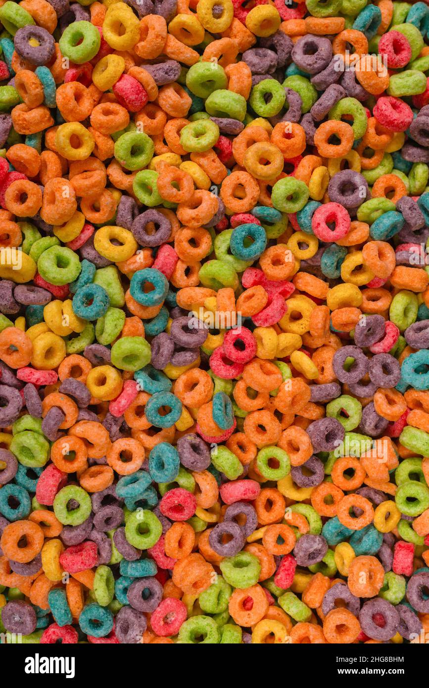 Sweet multicolored flakes, cereal loops as a background Stock Photo - Alamy