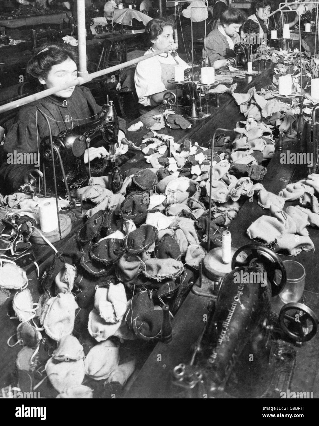 Singer sewing machines in 1915 detail, People making teddy bears in ...