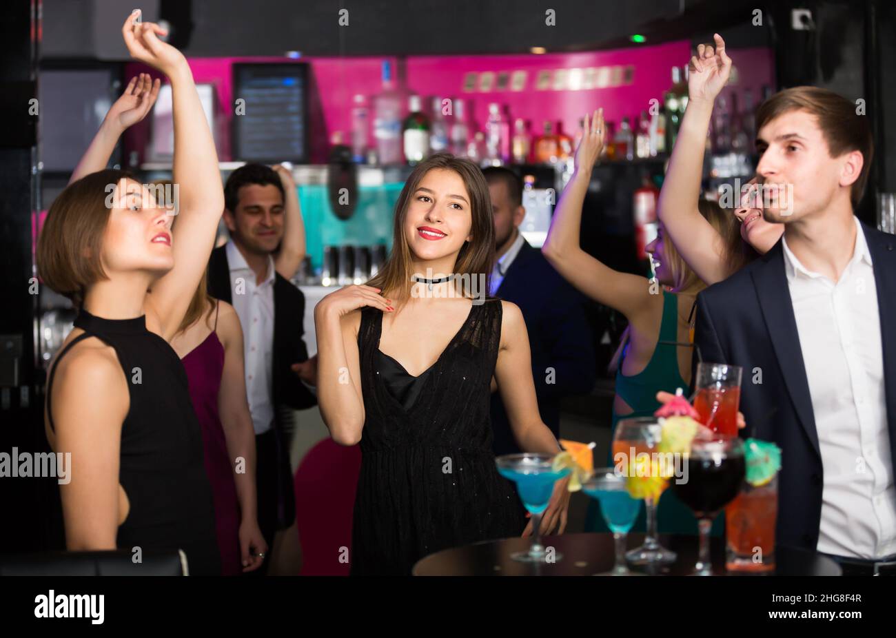 Glad colleagues dancing on corporate party Stock Photo - Alamy