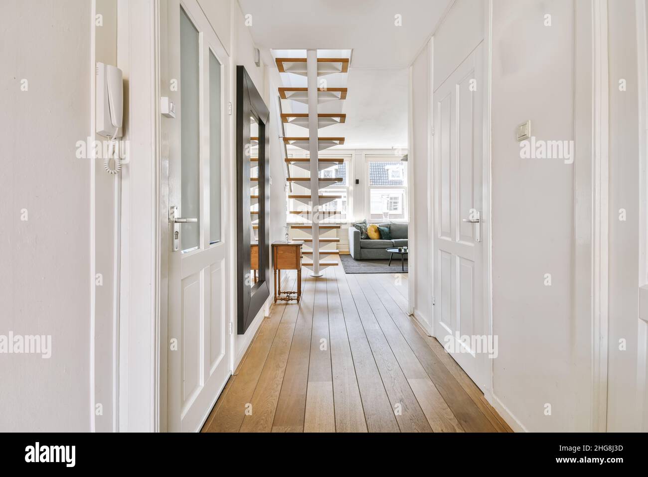Mind-blowing stylish corridor with wood floor and white walls Stock ...