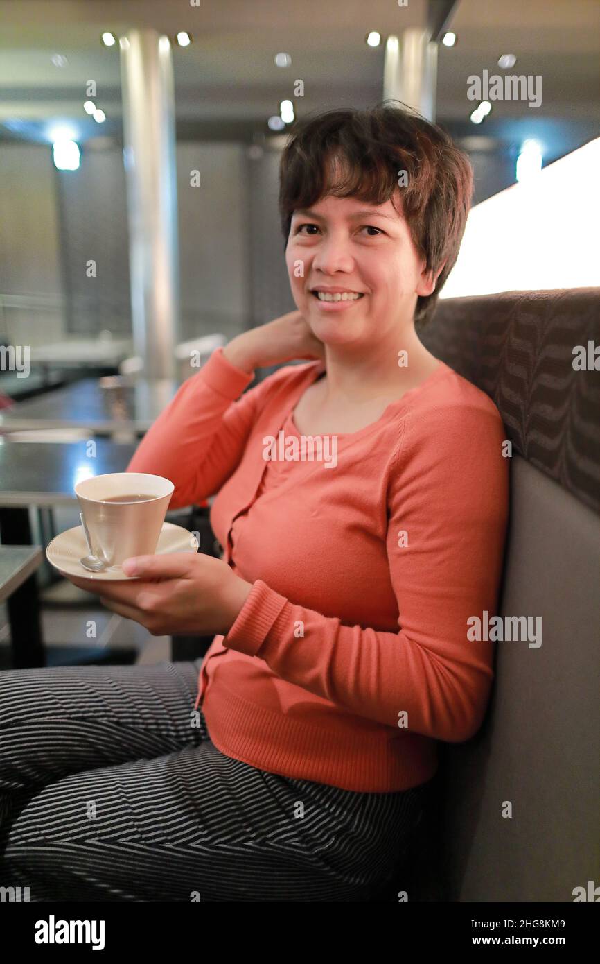 Foreigner at Ginza Tokyo Japan. Perfect Imperfect. Woman with a Cup of ...