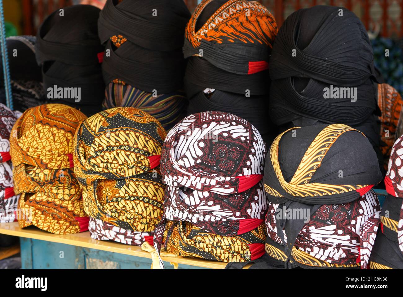 A blangkon or belangkon (in Indonesian) is a traditional Javanese ...