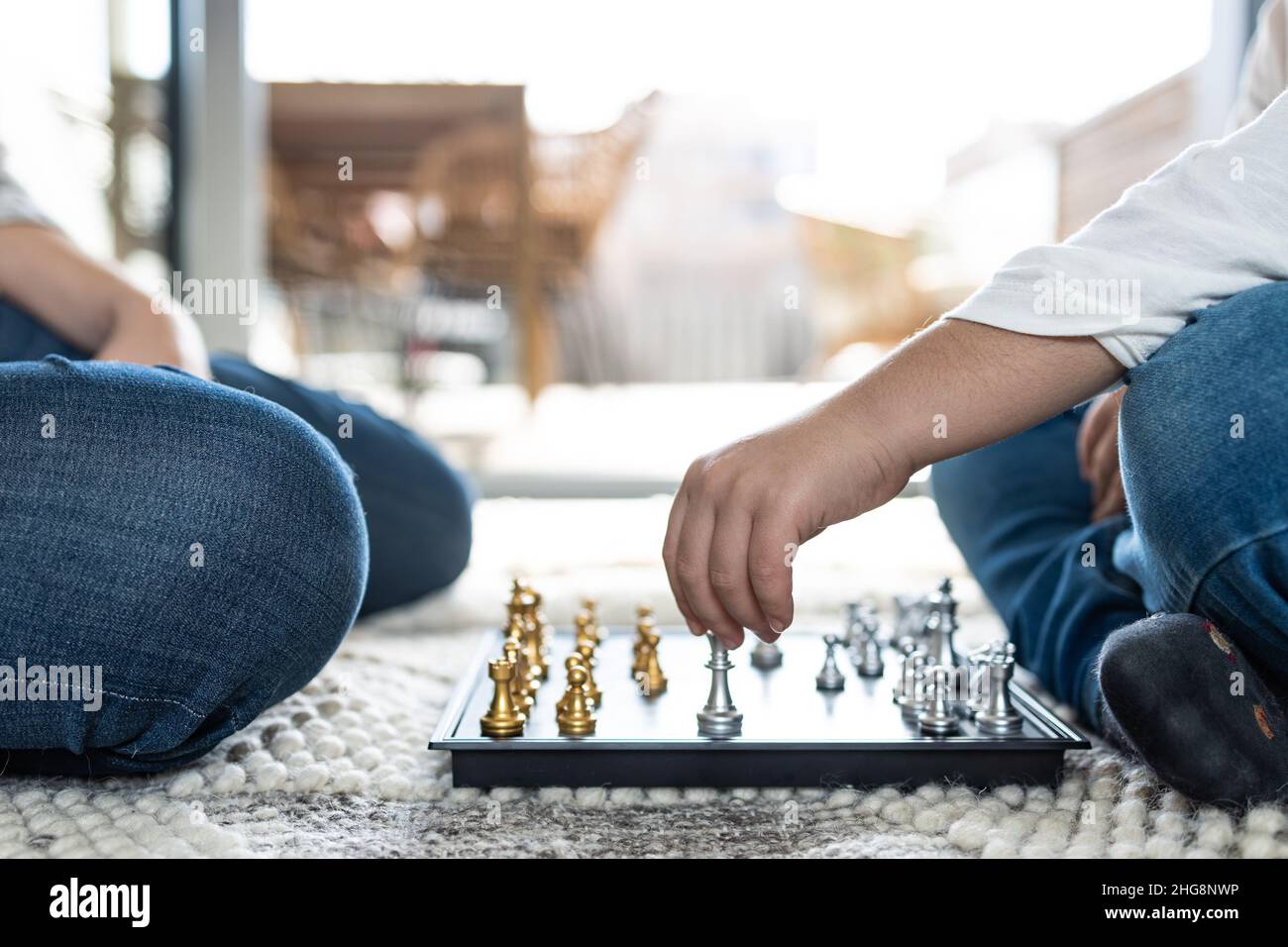 Smart boy playing chess hi-res stock photography and images - Alamy