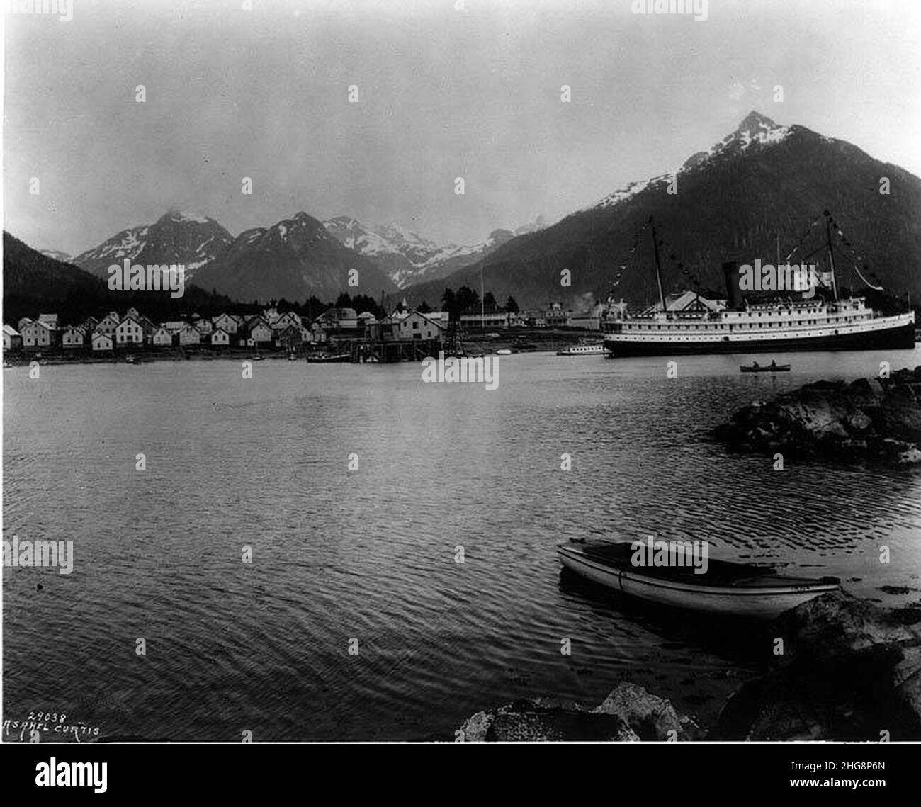Sitka, Alaska, from the water showing the steamer QUEEN anchored to the ...