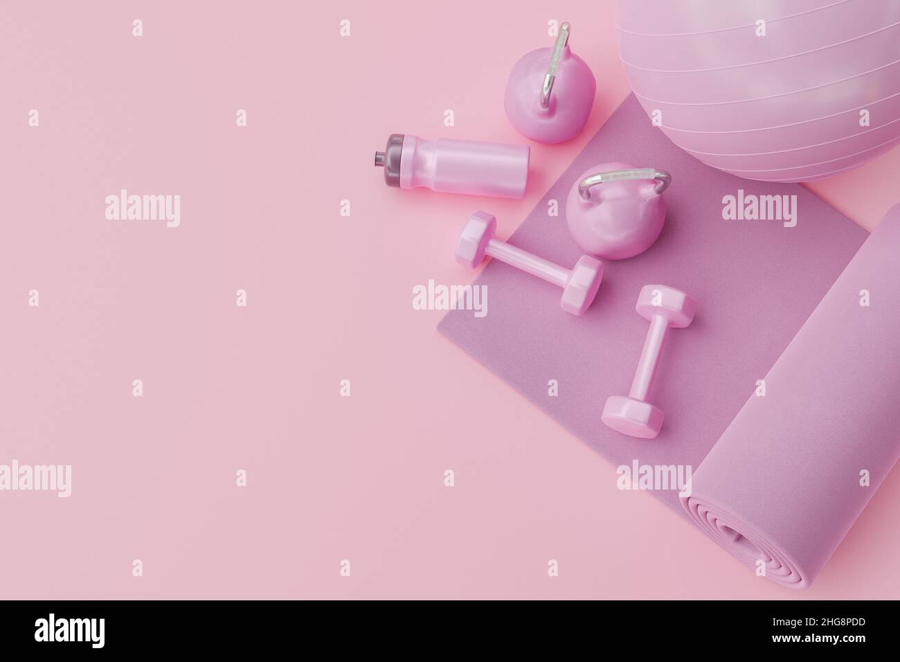 top view of pink exercise accessories with space for text. minimal ...