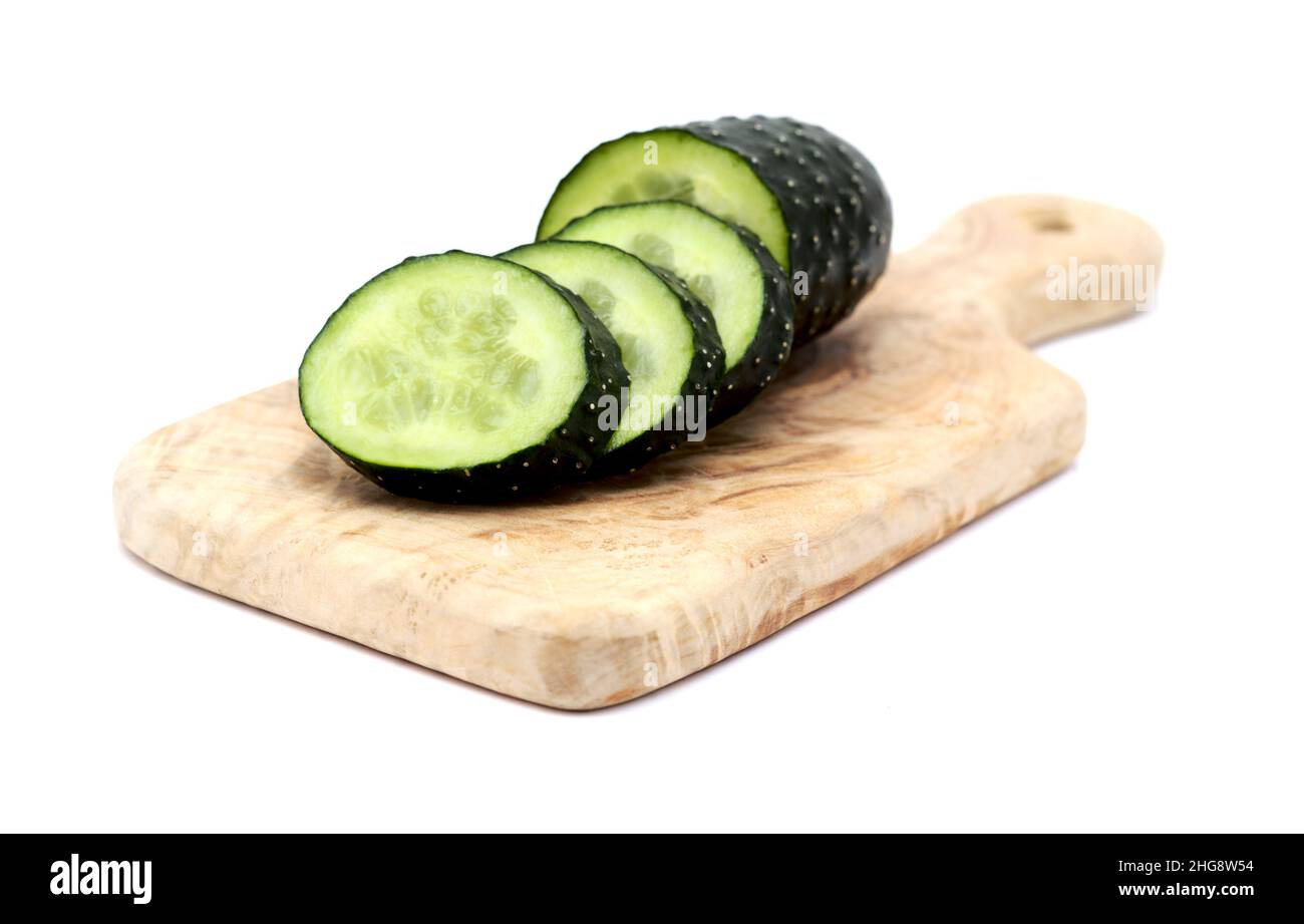 short dark green small cucumbers isolated on white background Stock ...