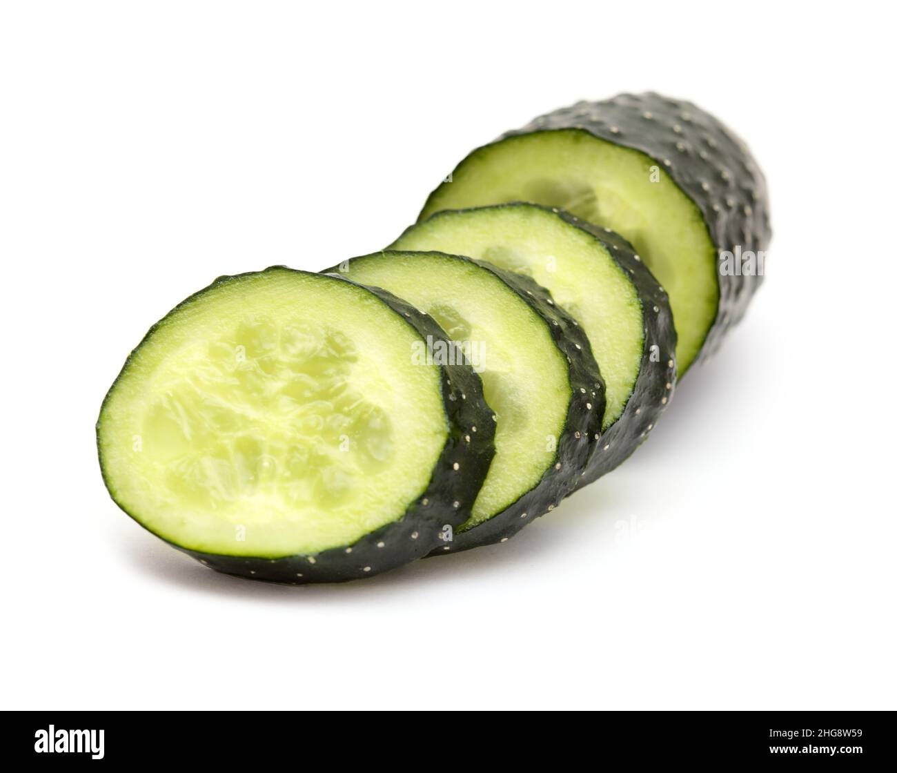 short dark green small cucumbers isolated on white background Stock ...