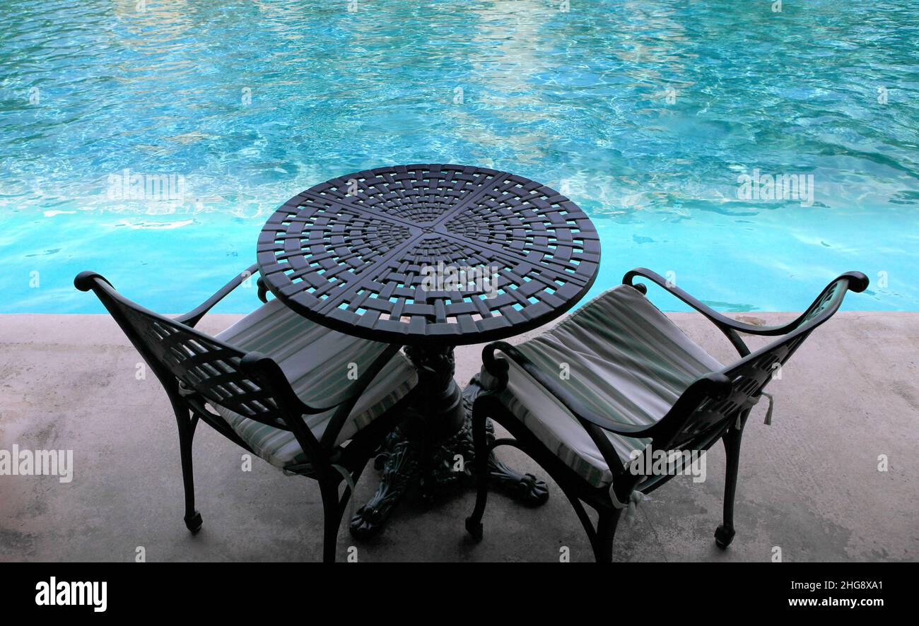 poolside , table and chairs Stock Photo - Alamy