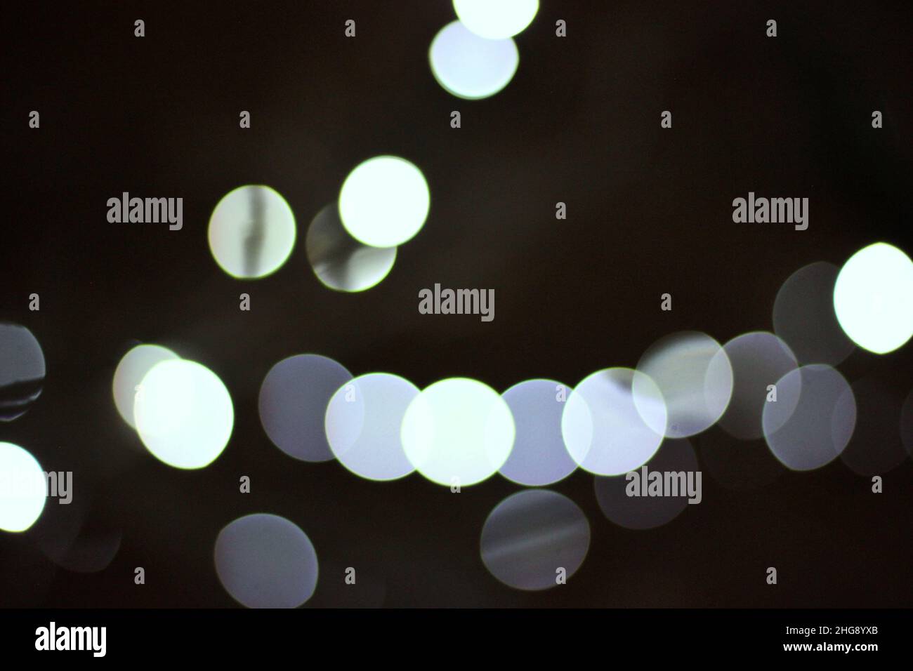 Beautiful colorful bokeh balls bouncing around as city lights Stock ...