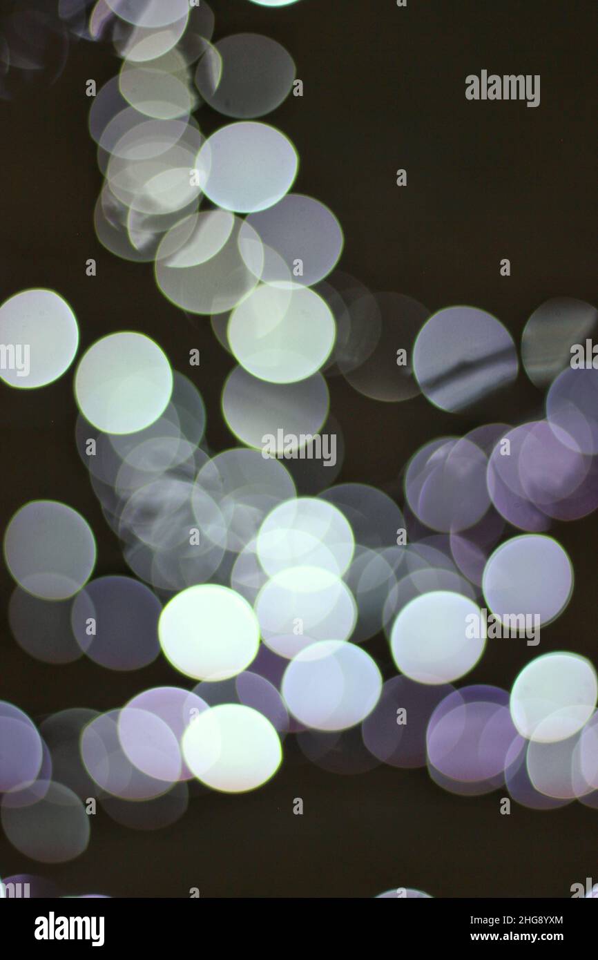 Beautiful colorful bokeh balls bouncing around as city lights Stock ...