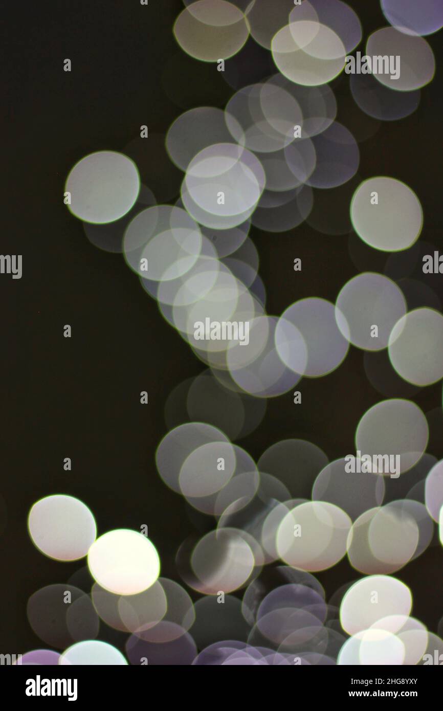 Beautiful colorful bokeh balls bouncing around as city lights Stock ...