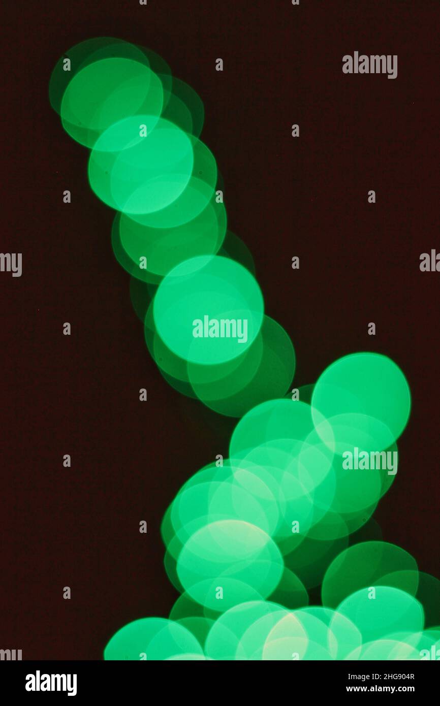 Beautiful colorful bokeh balls bouncing around as city lights Stock ...