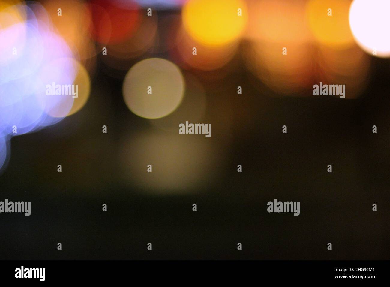 Beautiful colorful bokeh balls bouncing around as city lights Stock ...