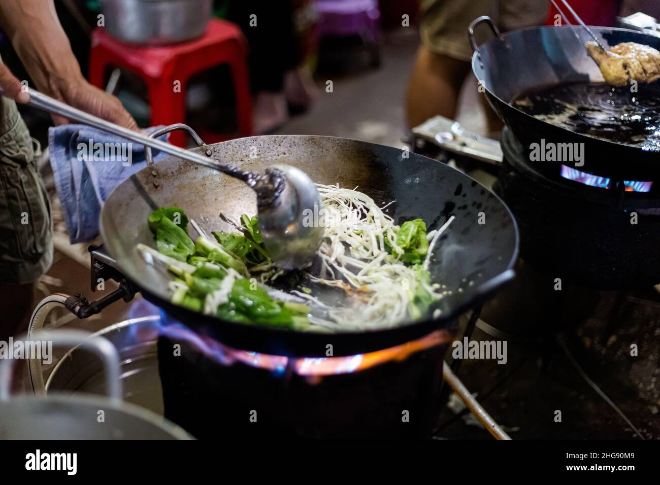 Delicious colorful local food vegan stir fry on the market. Traditional ...