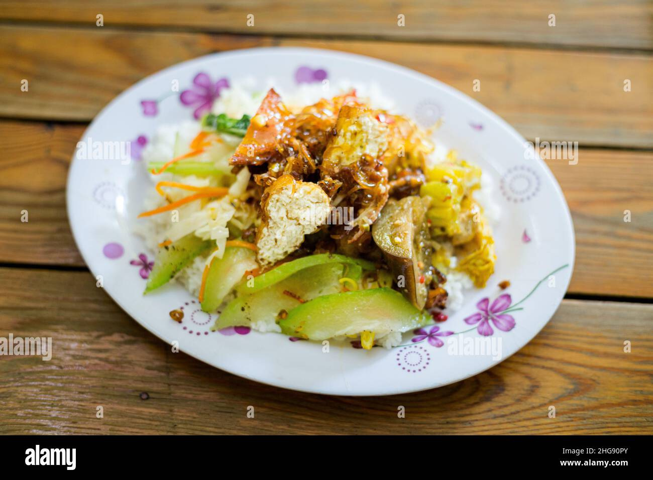 Delicious colorful local food vegan stir fry on the market. Traditional ...