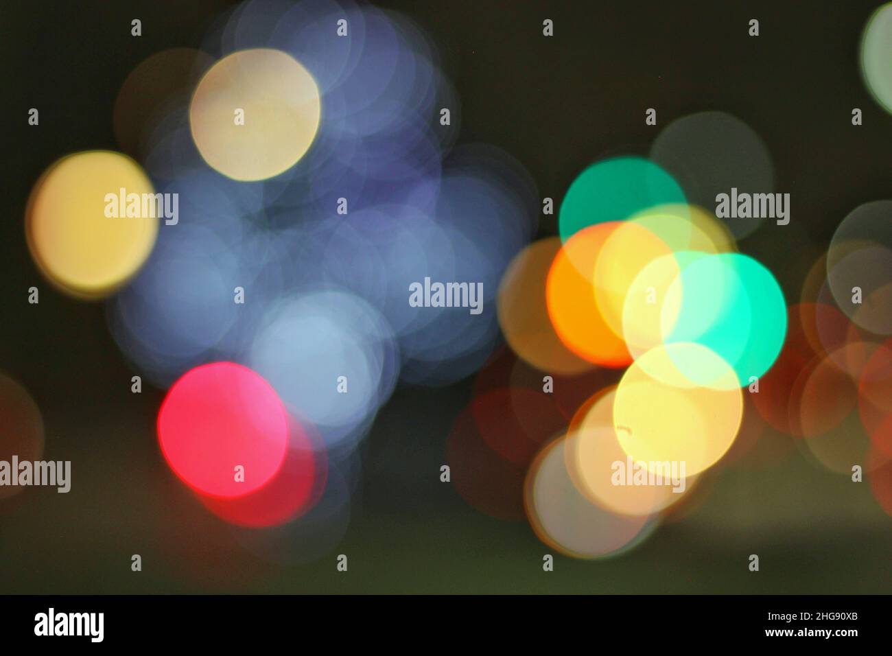 Beautiful colorful bokeh balls bouncing around as city lights Stock ...