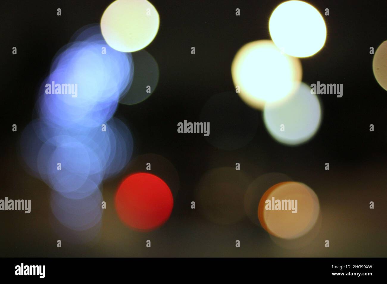 Beautiful colorful bokeh balls bouncing around as city lights Stock ...