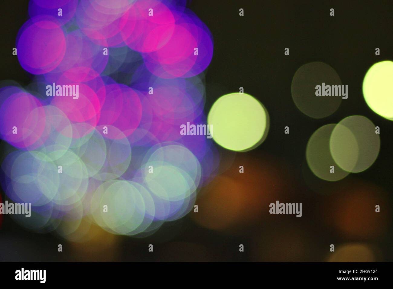 Beautiful colorful bokeh balls bouncing around as city lights Stock ...