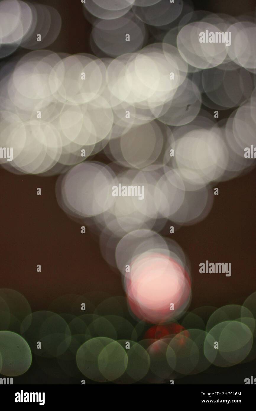 Beautiful colorful bokeh balls bouncing around as city lights Stock ...