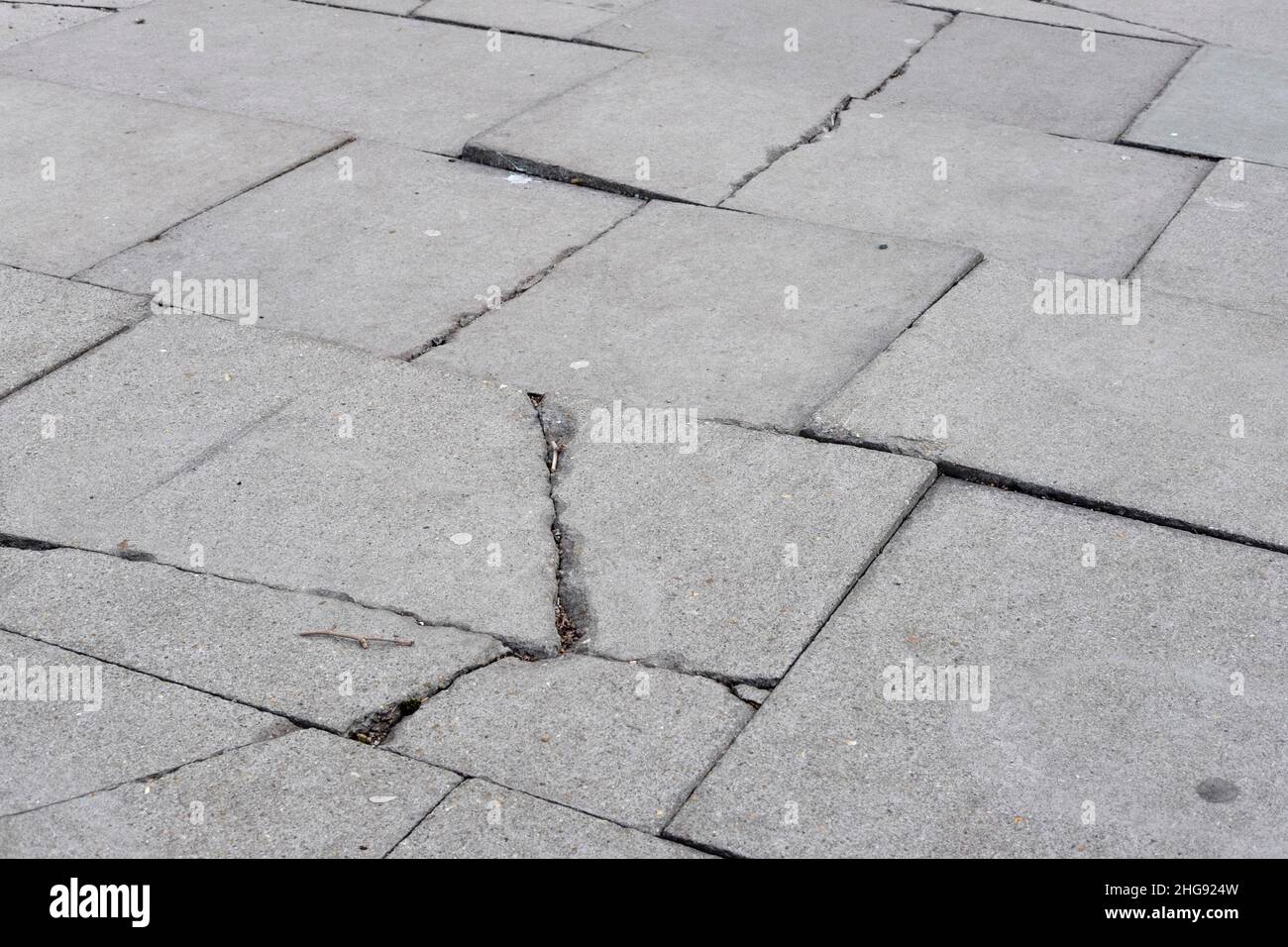 Broken and cracked paving stones in the London borough of Westminster ...