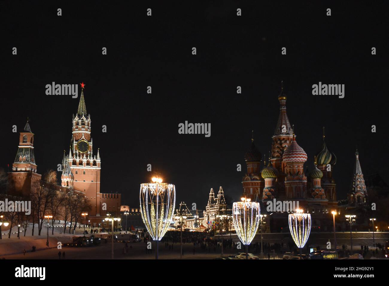 Red square lit at night Stock Photo - Alamy