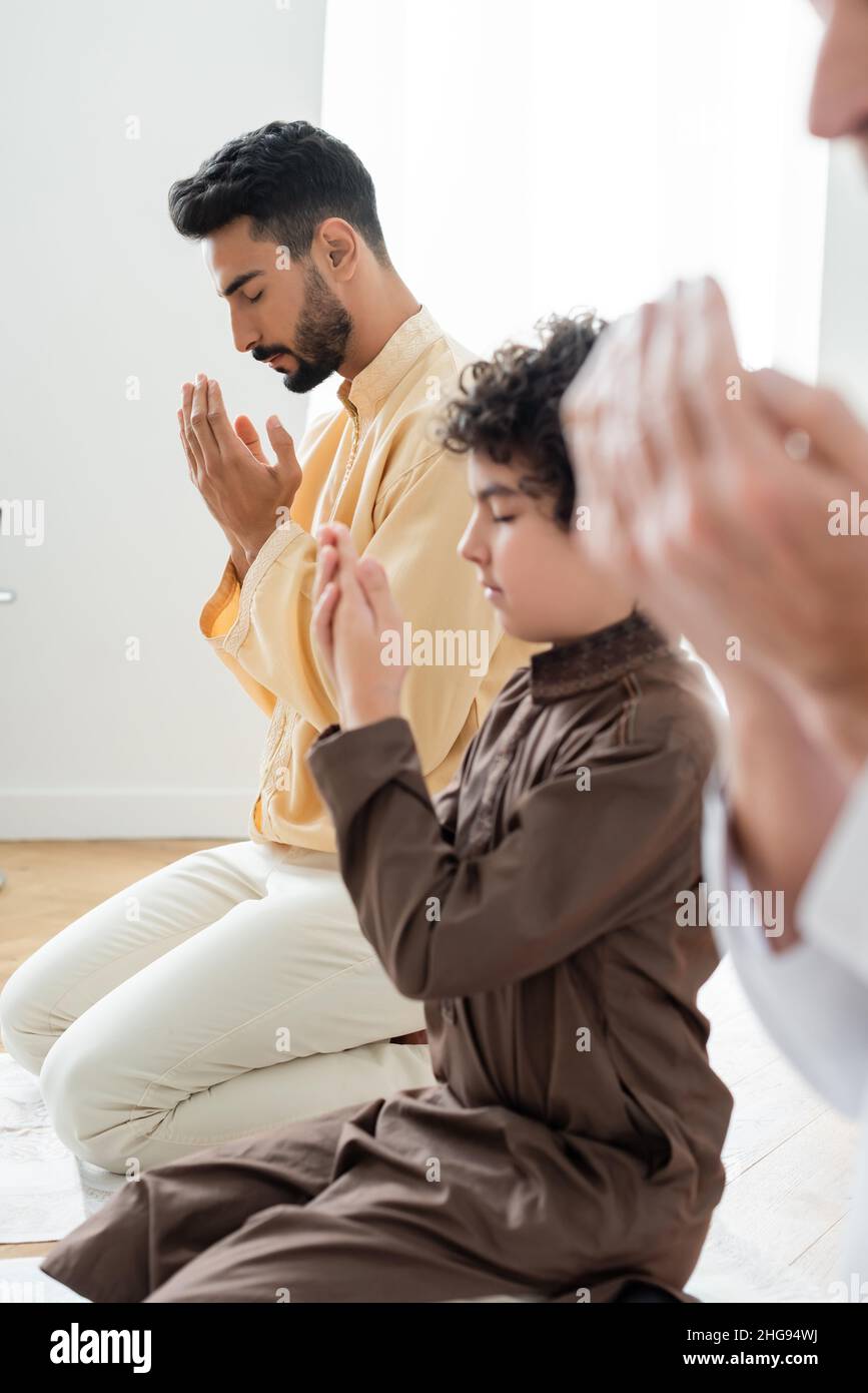 Praying dad hi-res stock photography and images - Alamy