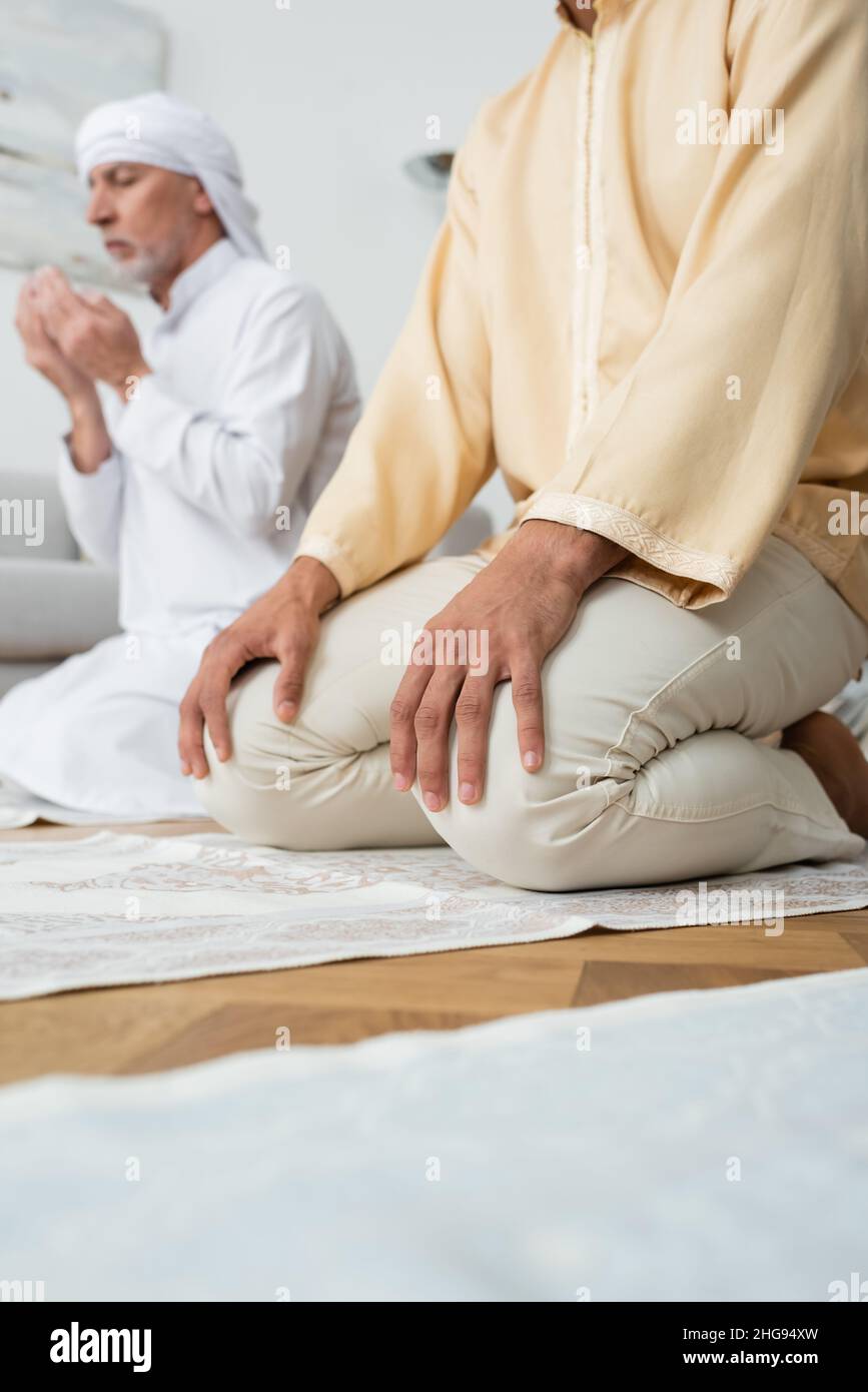 Muslim man sitting hi-res stock photography and images - Alamy