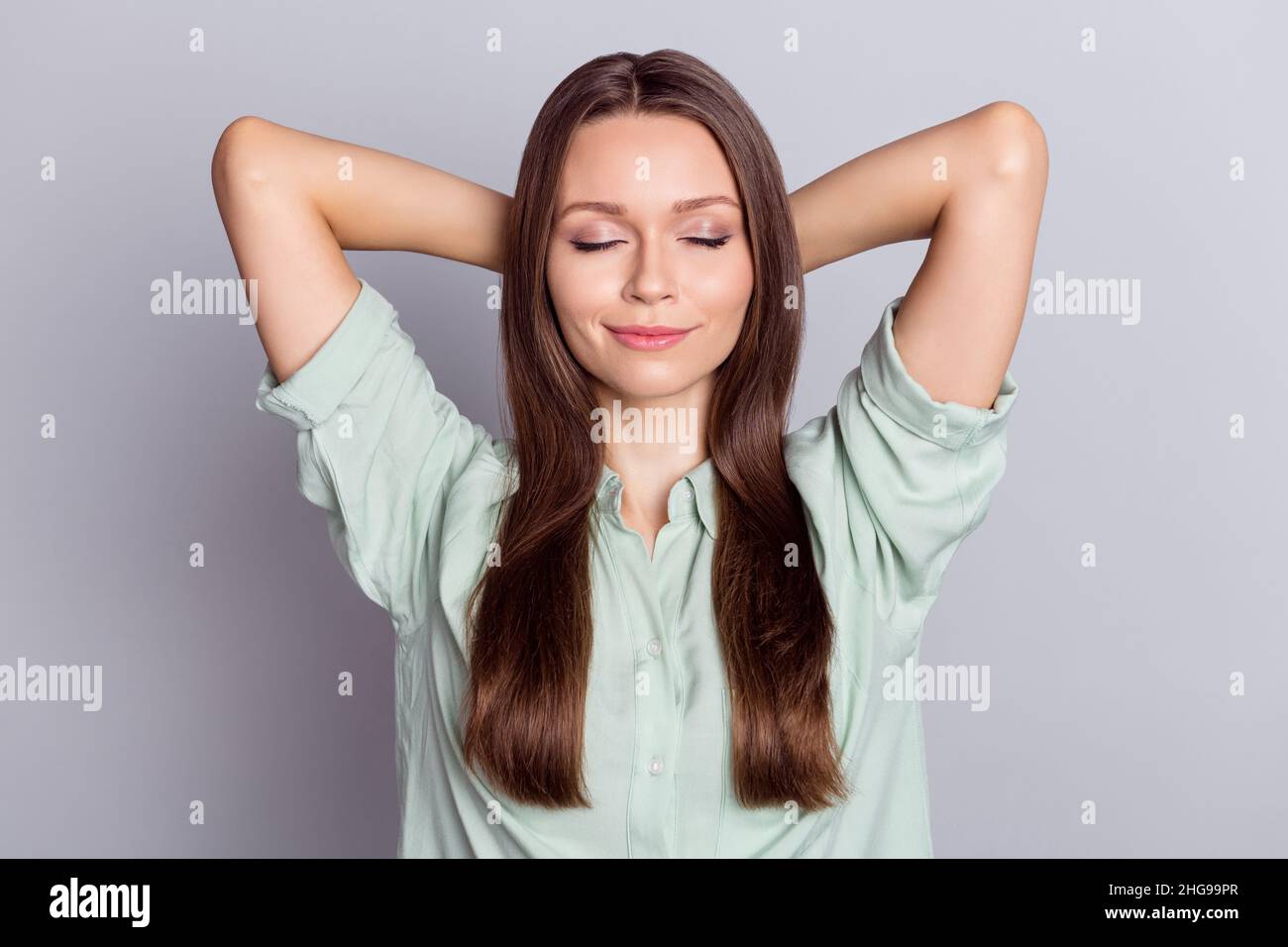 Photo of sleepy brunette lady arms head closed eyes wear blue blouse ...