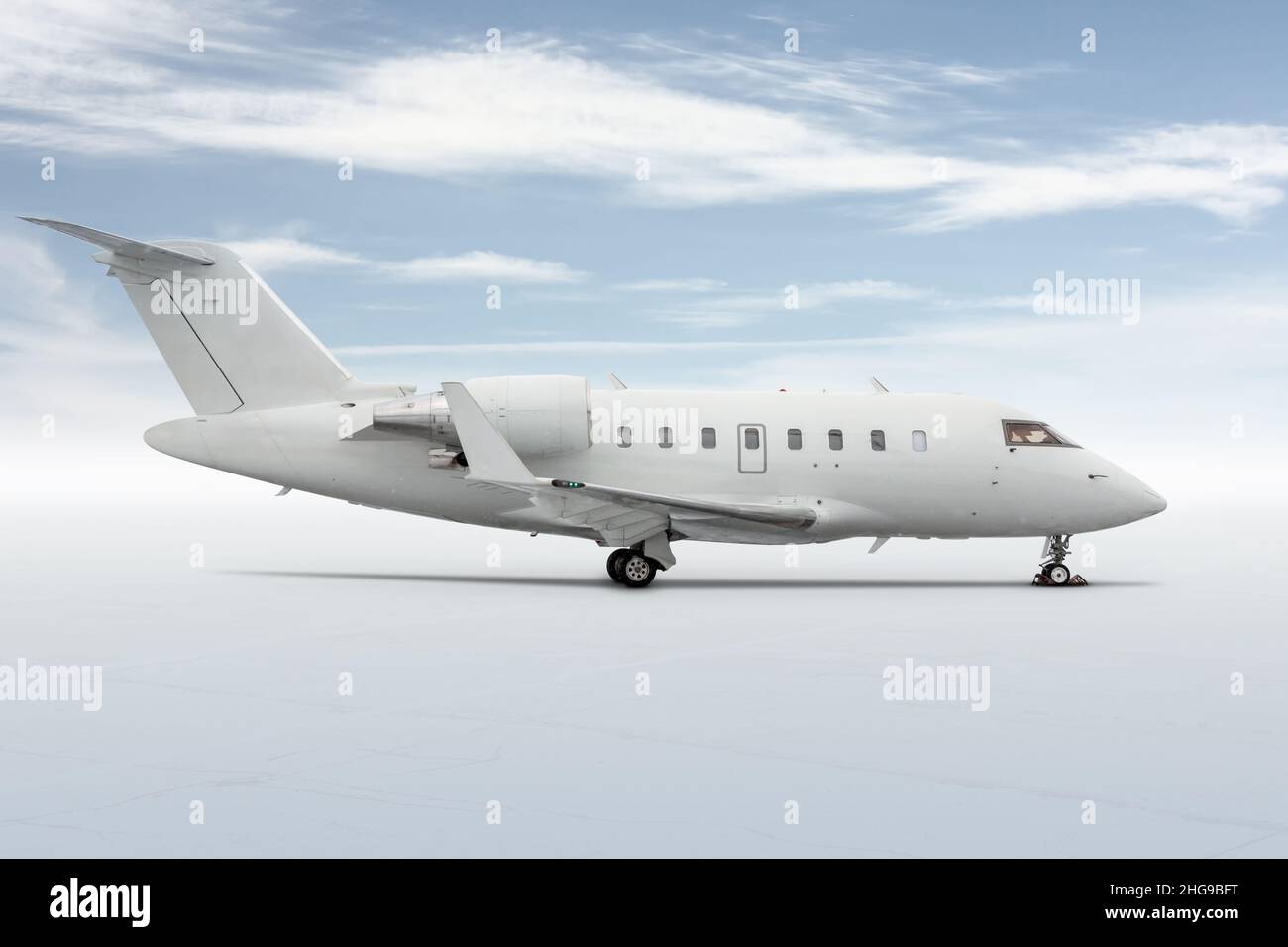 Modern white corporate business jet isolated on light background with ...