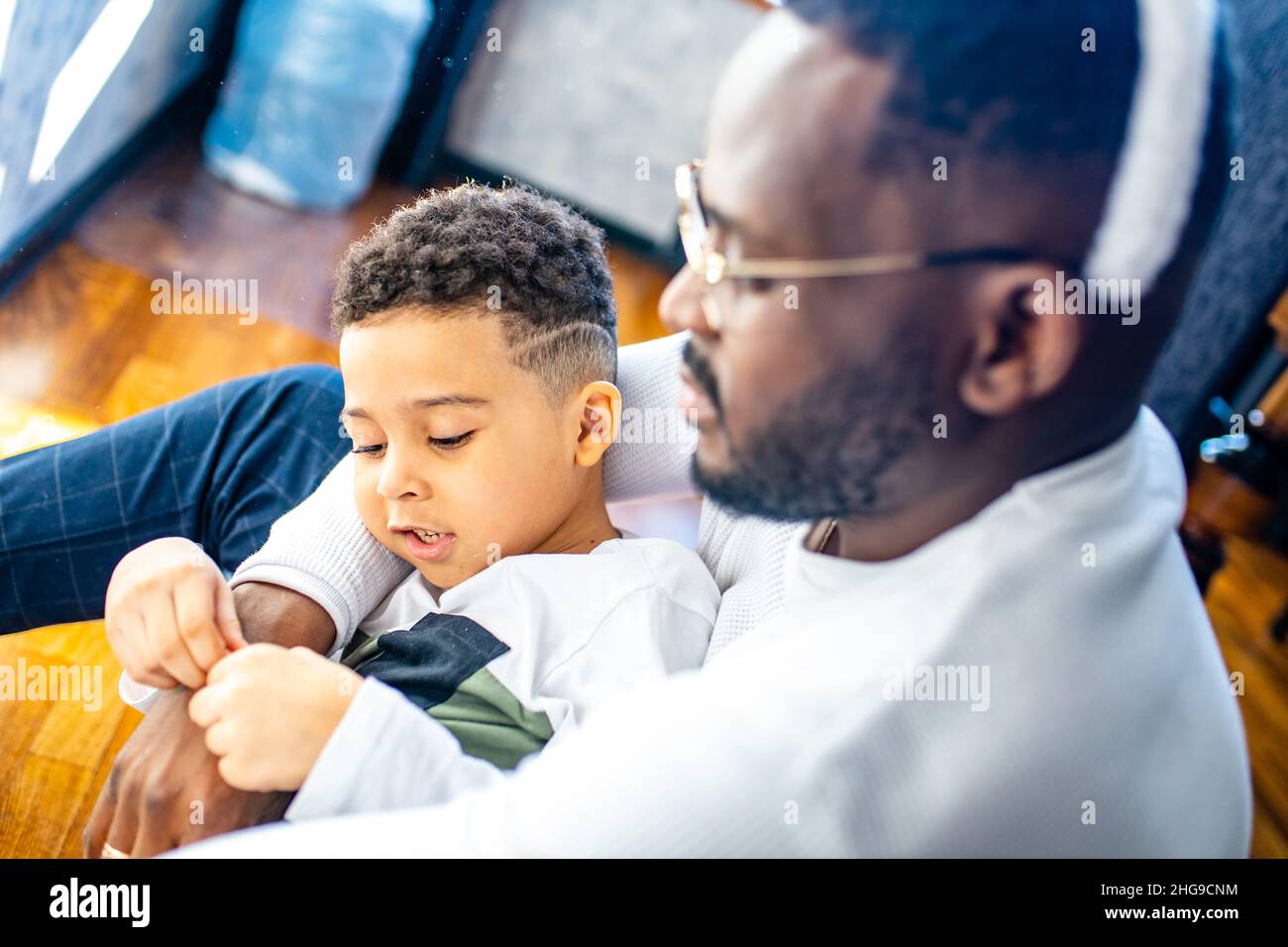 authentic ethnic multicultural people in living room day sunlight Stock ...