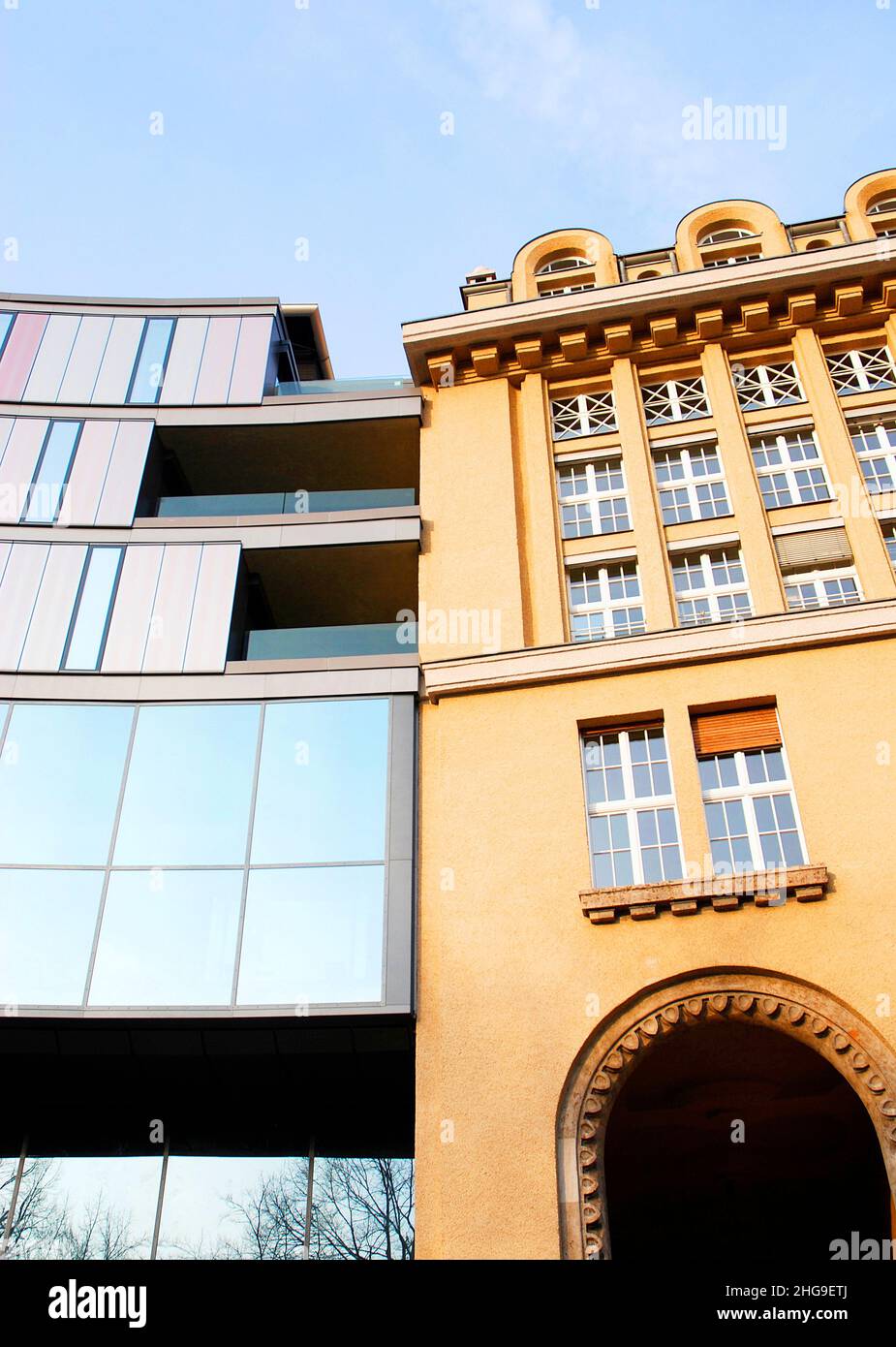 Old building and new modern building Stock Photo - Alamy