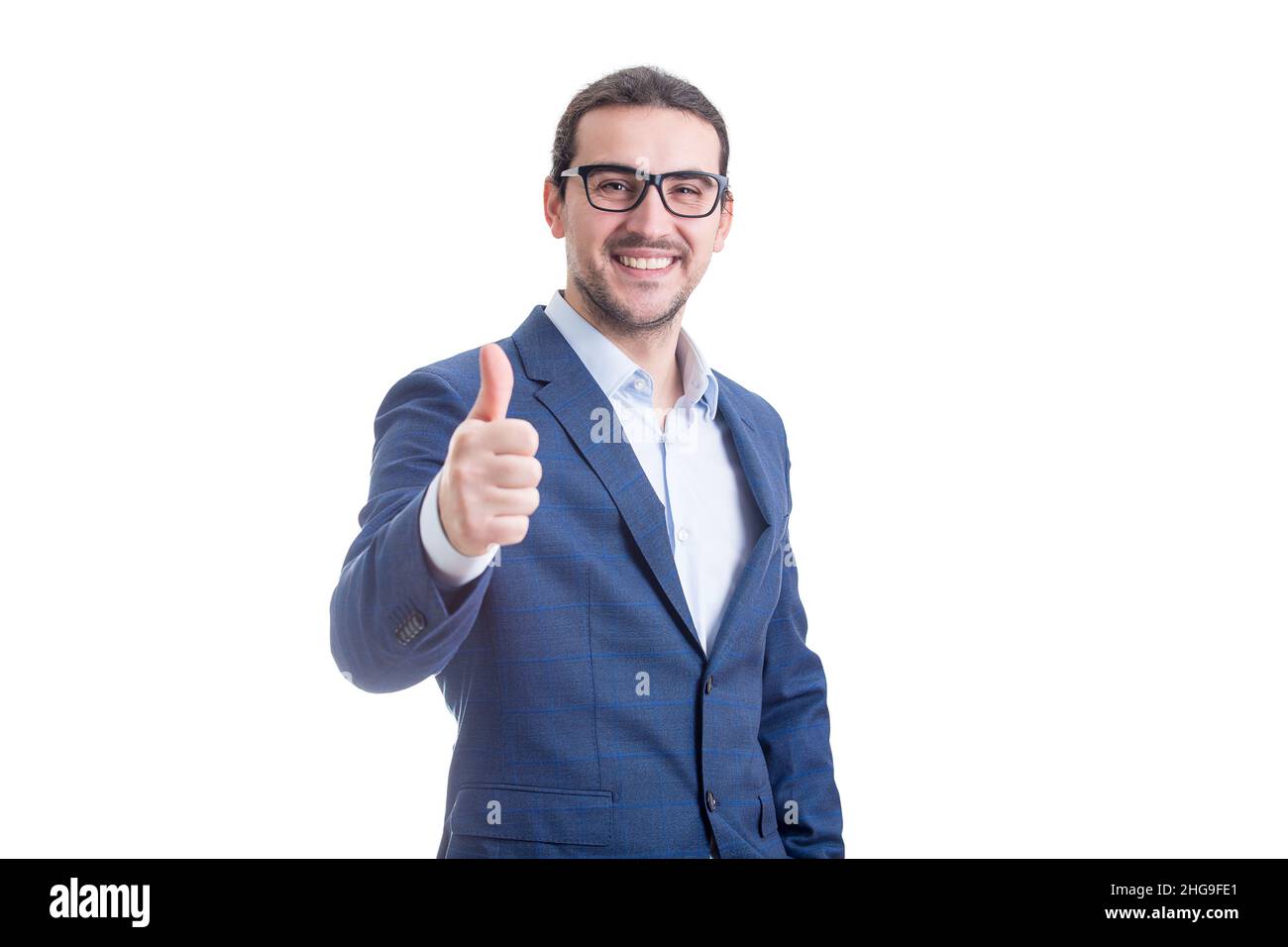 Cheerful businessman smiling broadly stretching hand shows thumb up ...