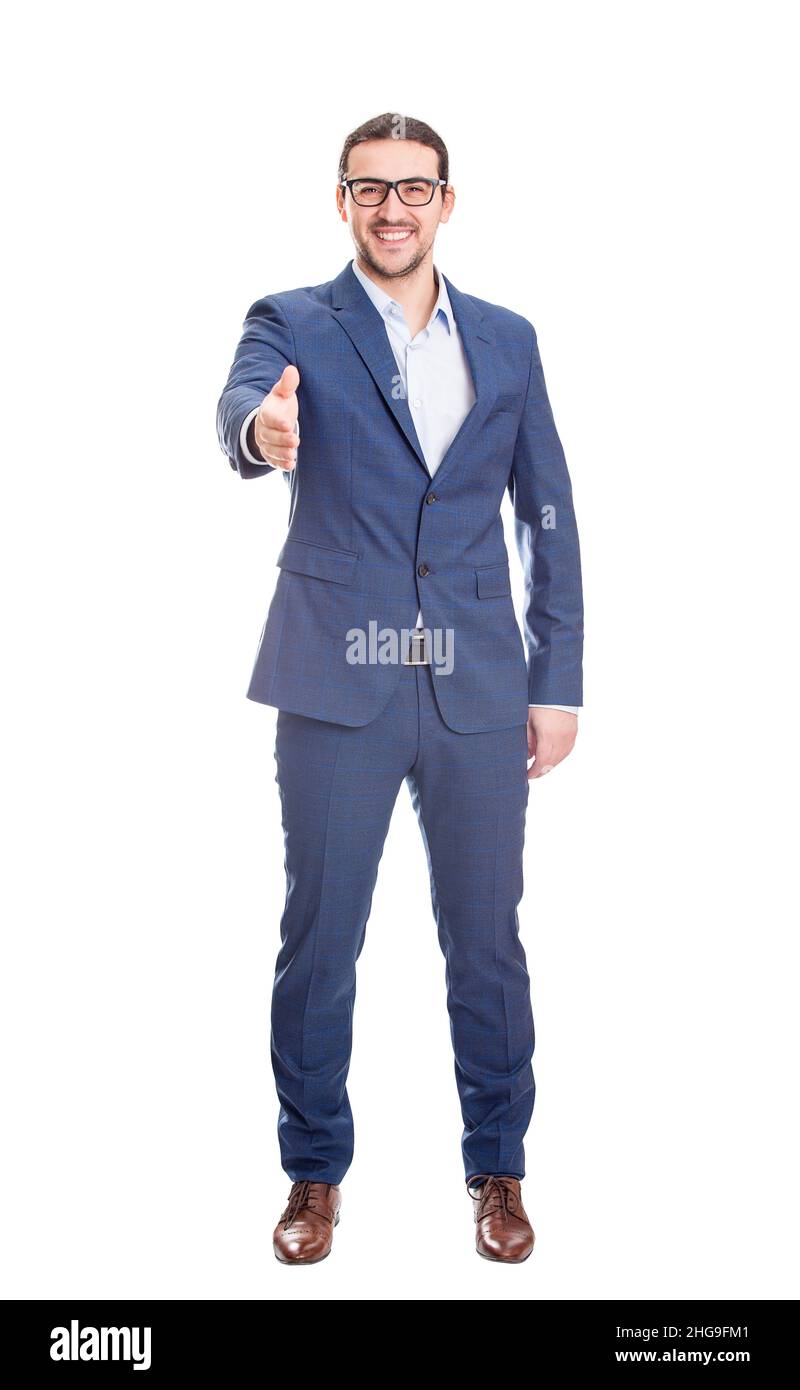 Full length portrait of confident businessman giving handshake greeting ...