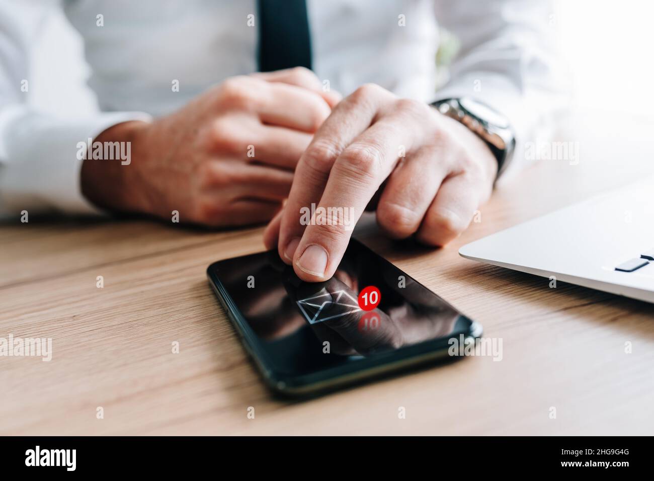 Businessman Opening Text Message Inbox By Tapping The Smartphone