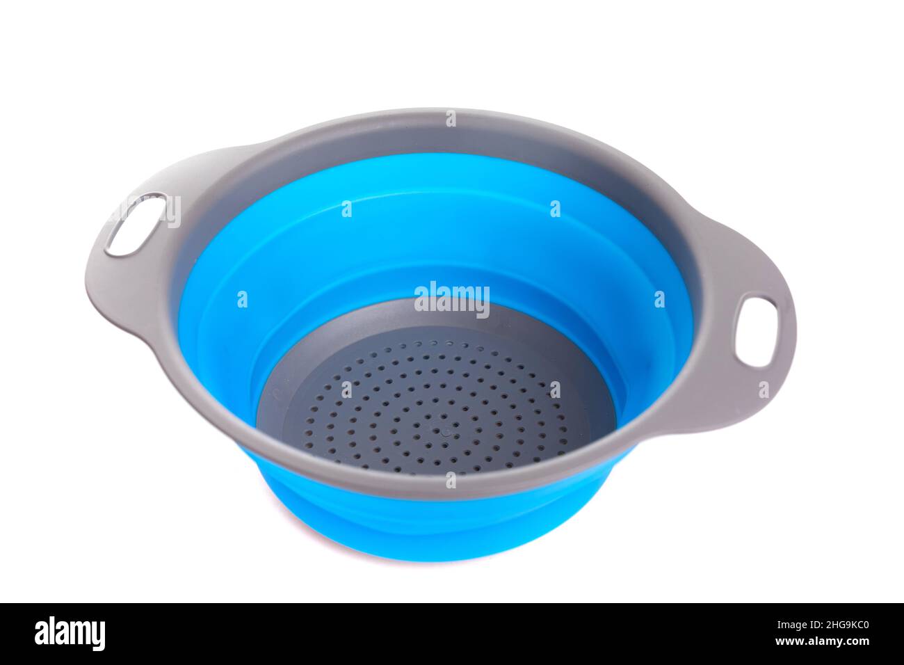 collapsible plastic rubberized colander on white isolated background ...