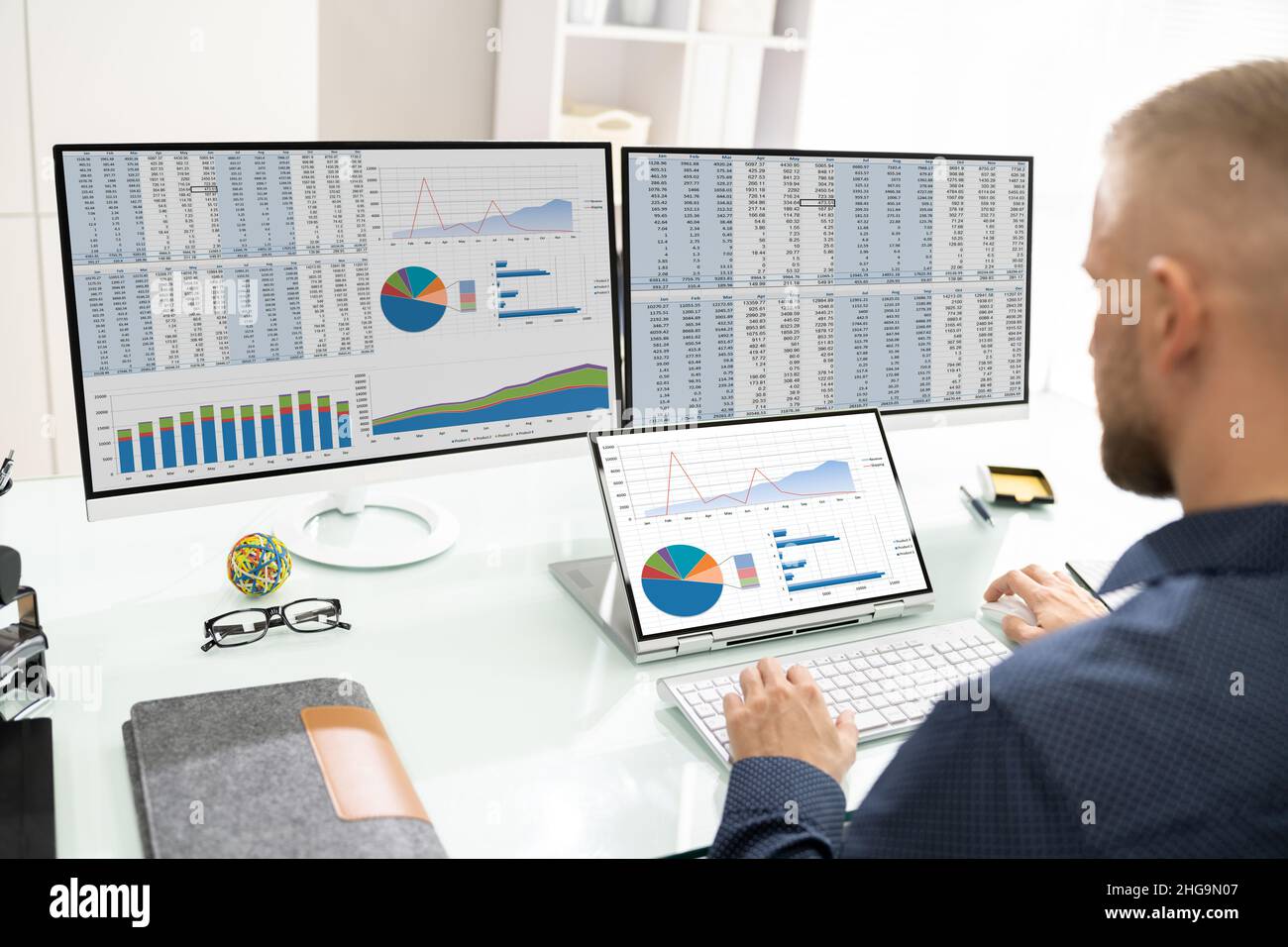 Analyst Working With Spreadsheet Business Data On Computer Stock Photo ...