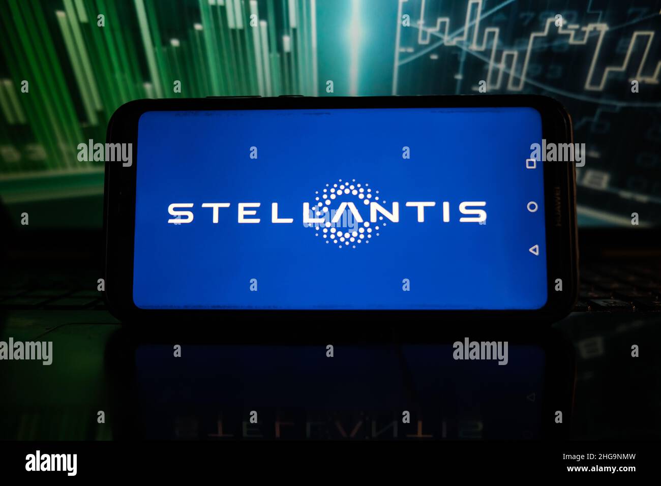 In this photo illustration a Stellantis logo is displayed on a ...