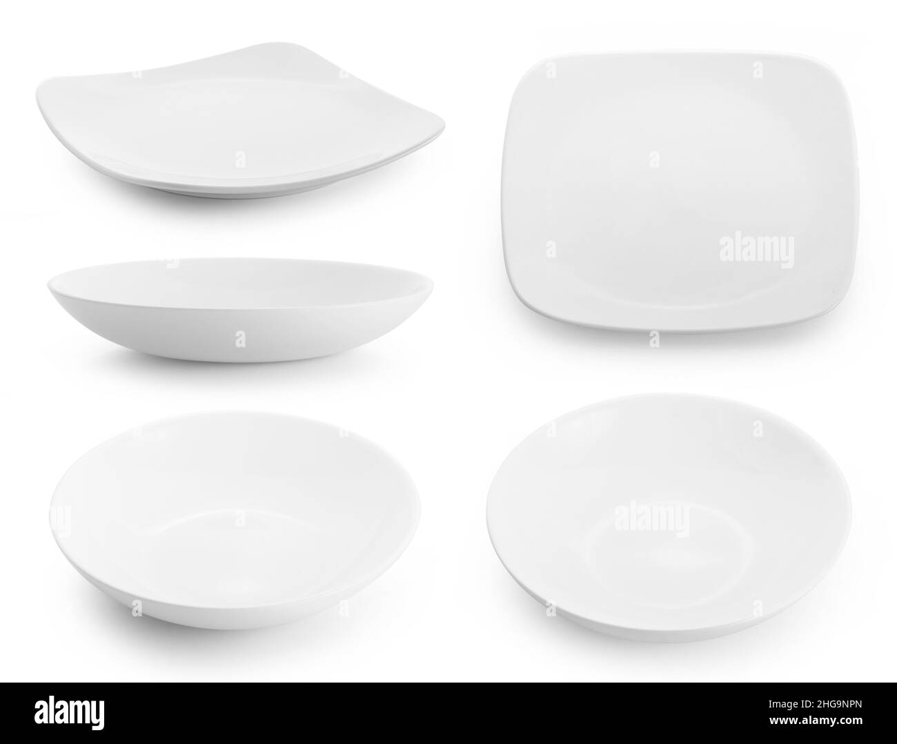 set of white plate on white background Stock Photo - Alamy