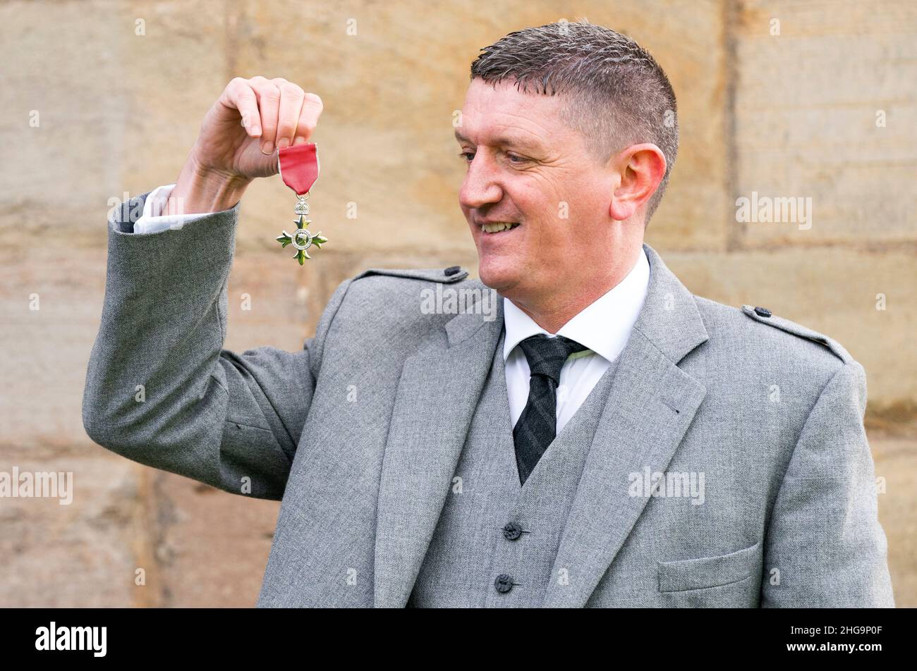 CraigThomson after receiving his MBE during an Investiture ceremony at ...