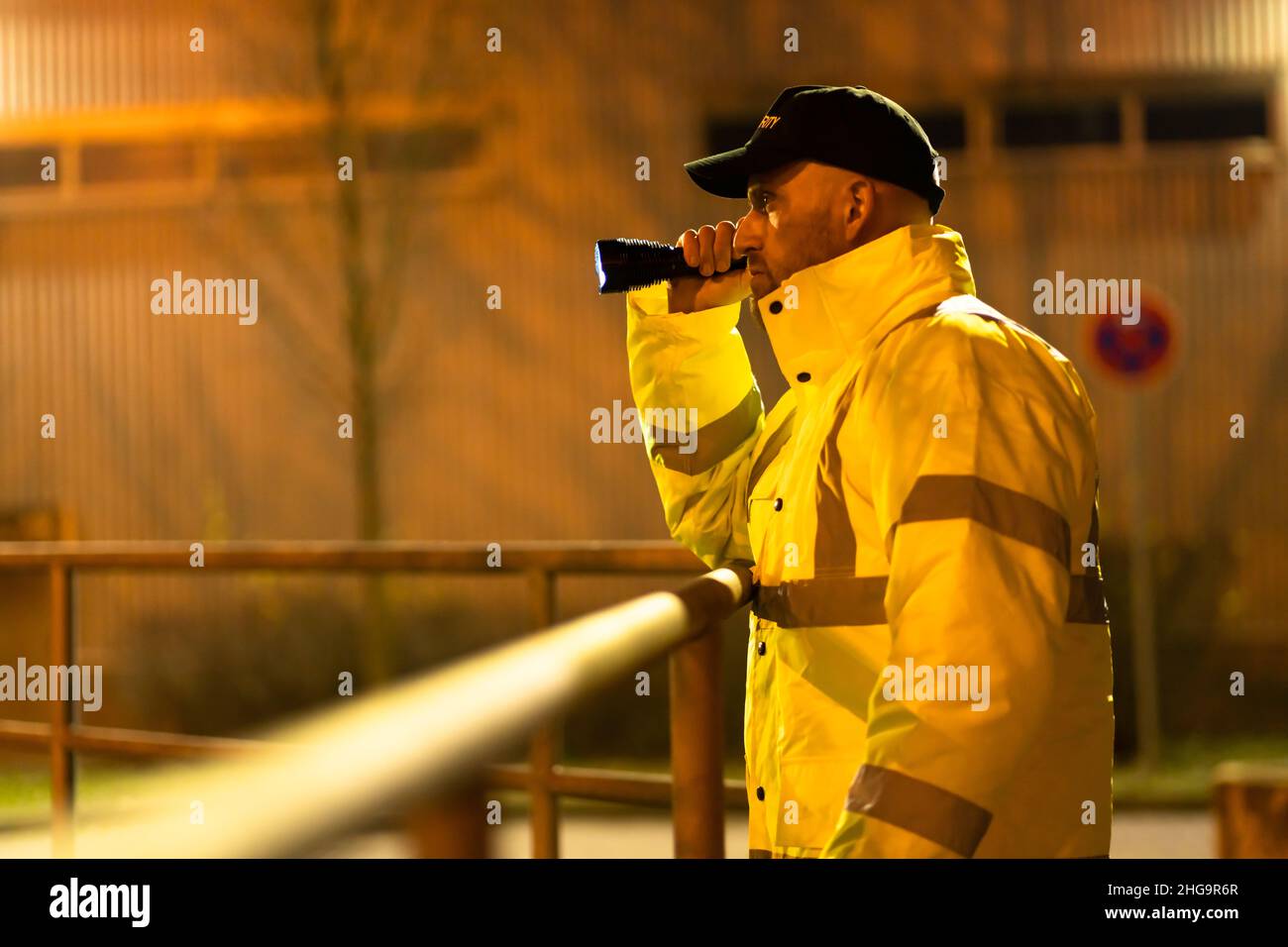 Security Guard Walking Building Perimeter With Flashlight At Night ...